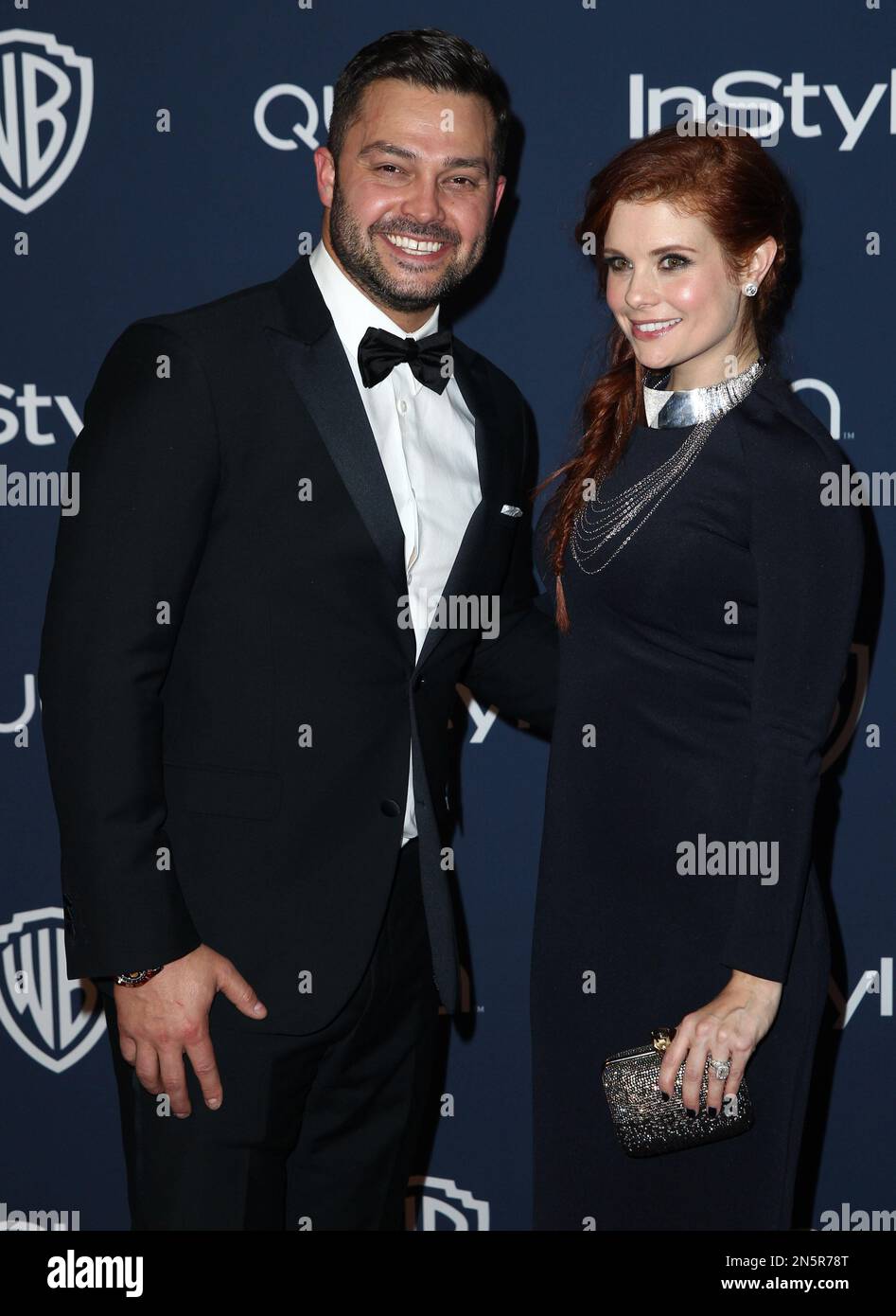 Nick Swisher, left, and JoAnna Garcia Swisher arrive at the 15th annual ...
