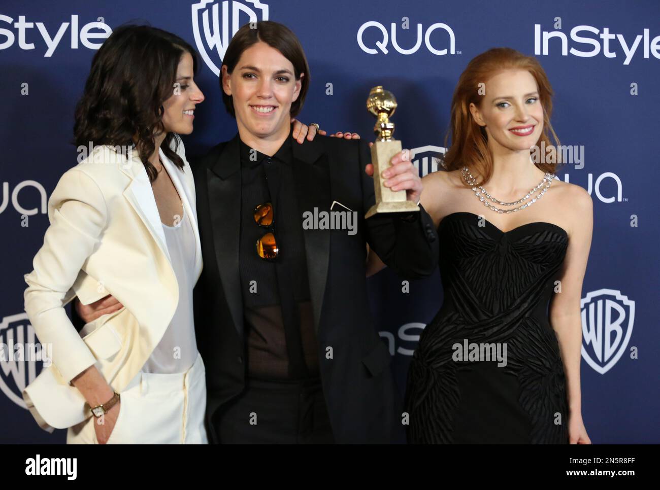 From left, Robyn Shapiro, Megan Ellison, and Jessica Chastain arrive at ...