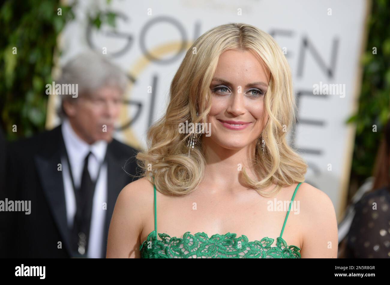 Taylor Schilling arrives at the 71st annual Golden Globe Awards at the ...