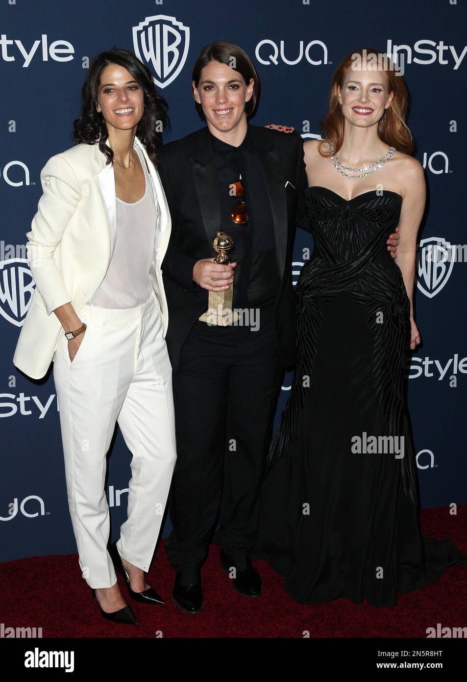From left, Robyn Shapiro, Megan Ellison, and Jessica Chastain arrive at ...