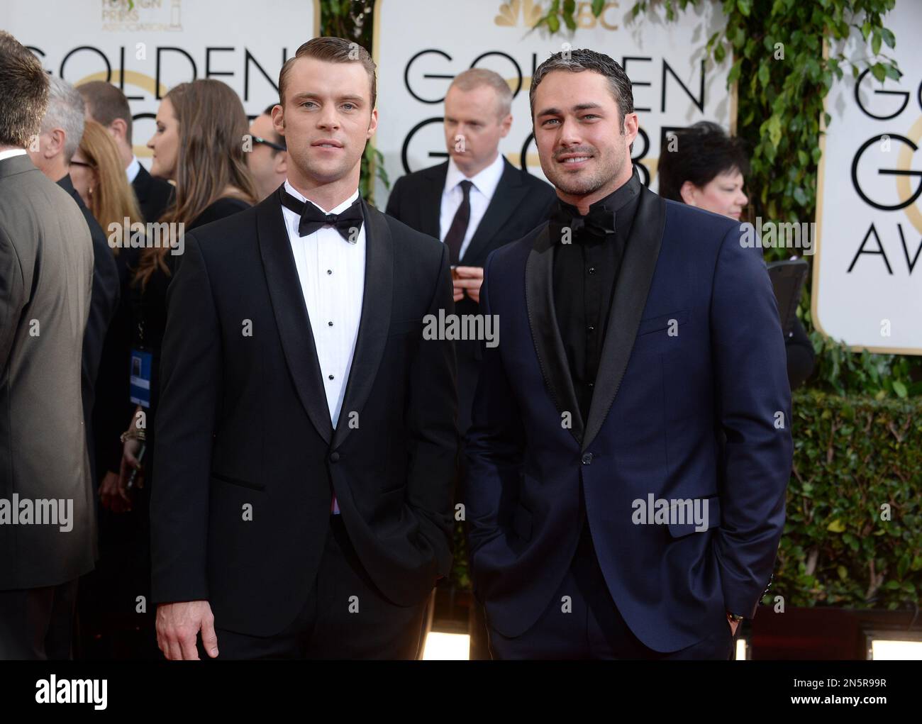 Jesse Spencer, left, and Taylor Kinney arrive at the 71st annual Golden ...
