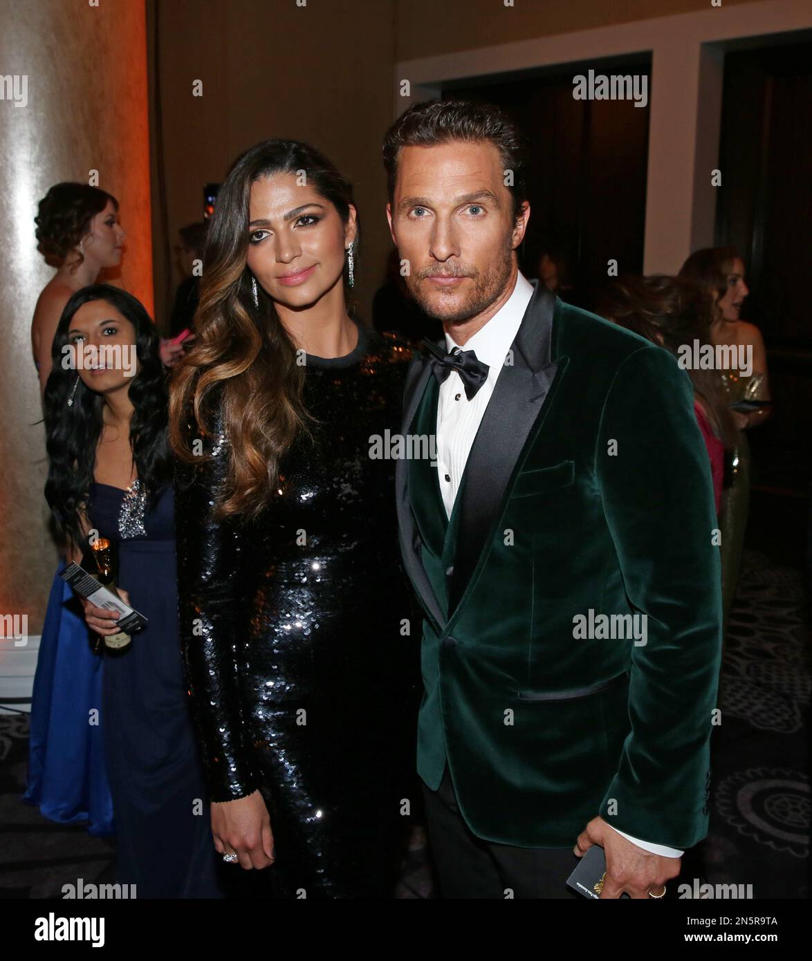 Camila Alves, left, and Matthew McConaughey pose in the audience at the ...