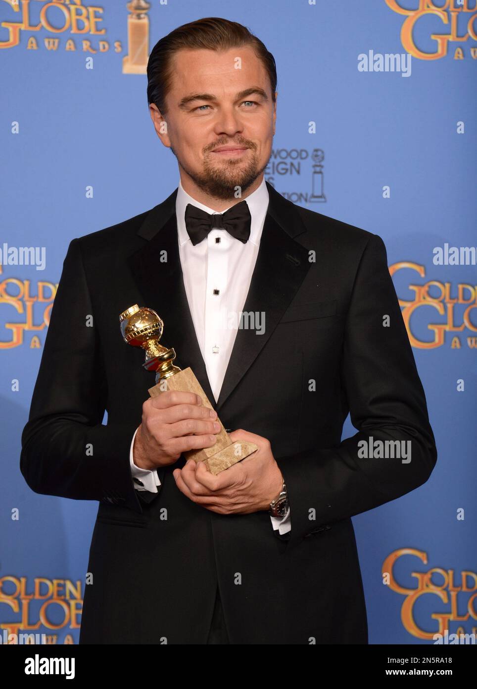 Leonardo DiCaprio poses in the press room with the award for best actor ...