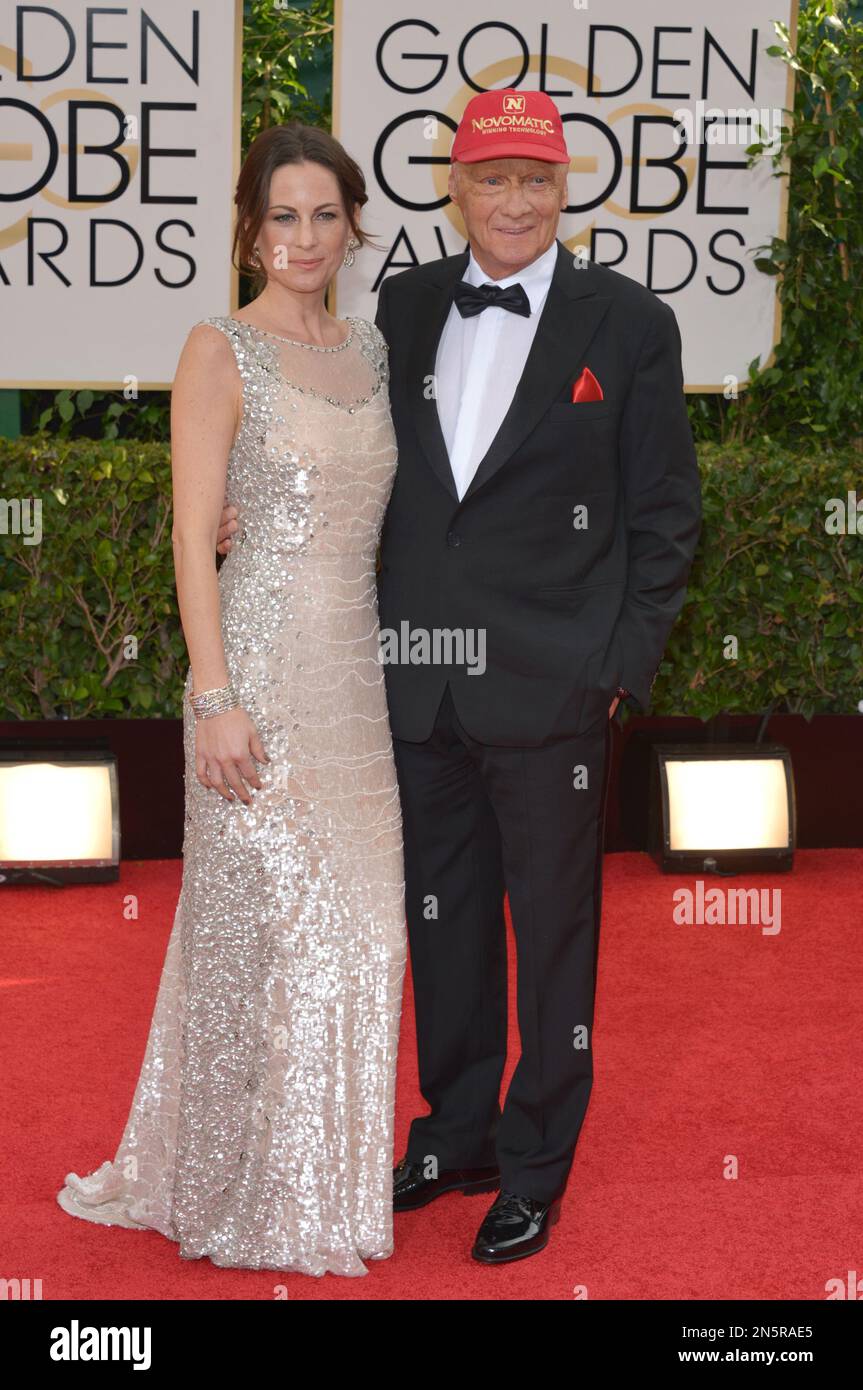 Birgit Wetzinger, left, and Niki Lauda arrive at the 71st annual Golden ...