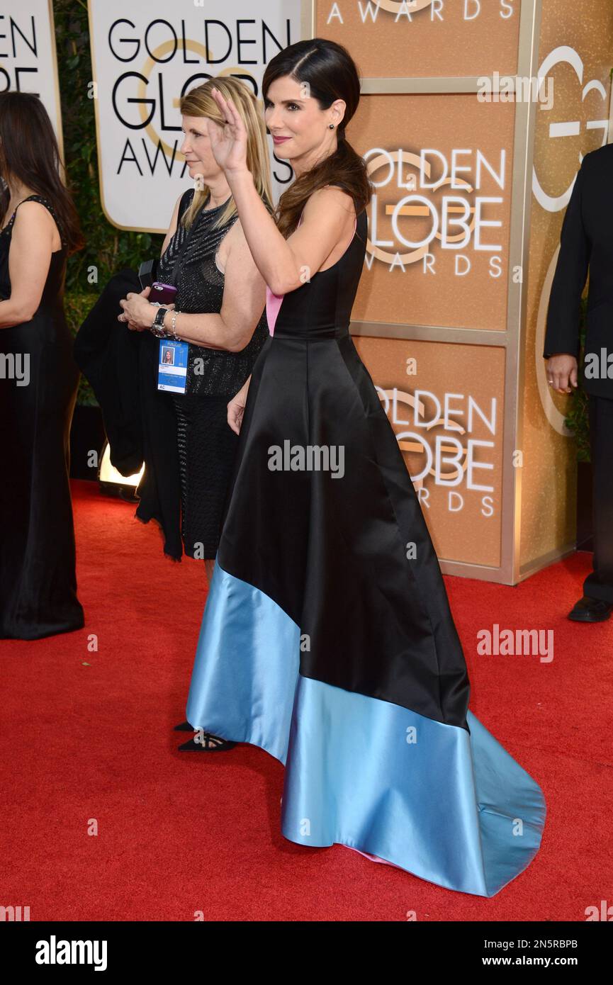 Sandra Bullock arrives at the 71st annual Golden Globe Awards at the ...