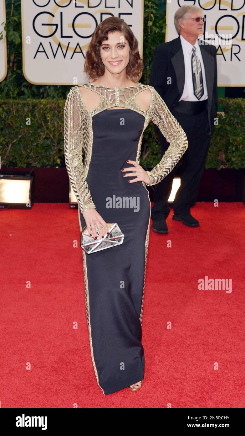 Lizzy Caplan arrives at the 71st annual Golden Globe Awards at the Beverly Hilton Hotel on ...