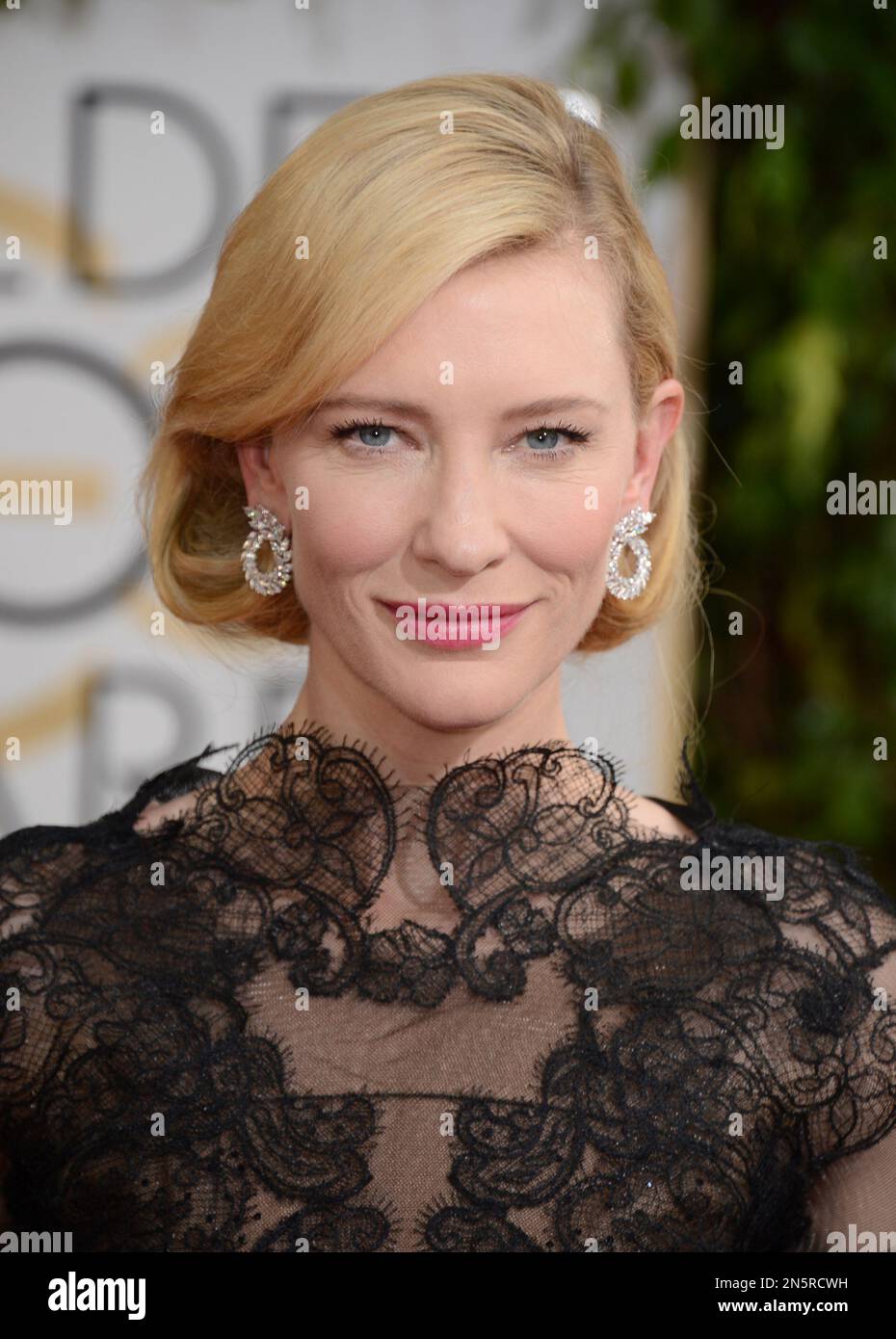 Cate Blanchett arrives at the 71st annual Golden Globe Awards at the ...