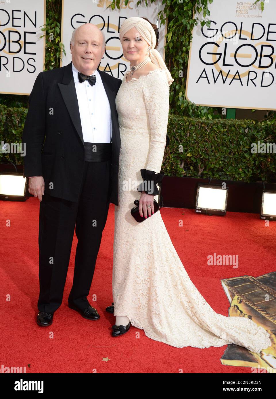Julian Fellowes, left, and Emma Joy Kitchener arrive at the 71st annual ...