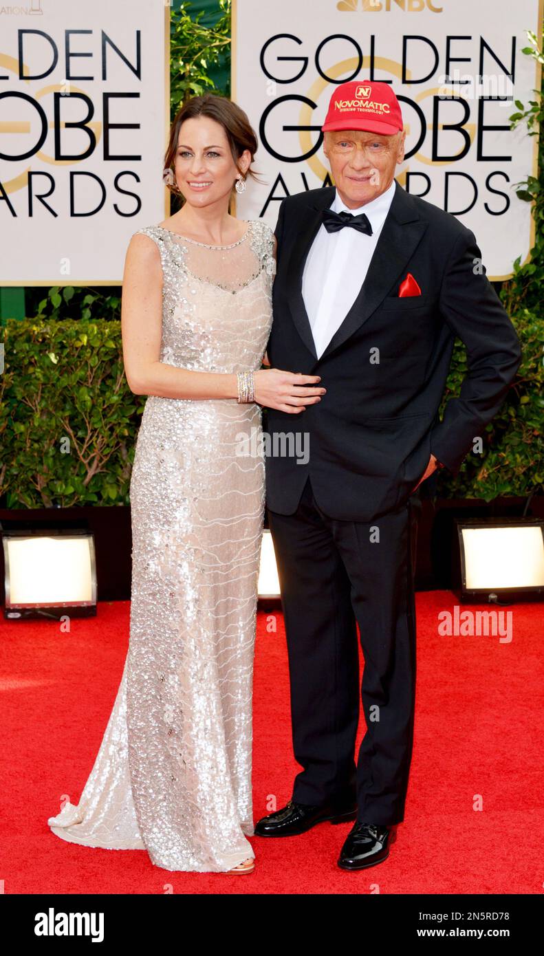 Birgit Wetzinger, left, and Niki Lauda arrive at the 71st annual Golden ...