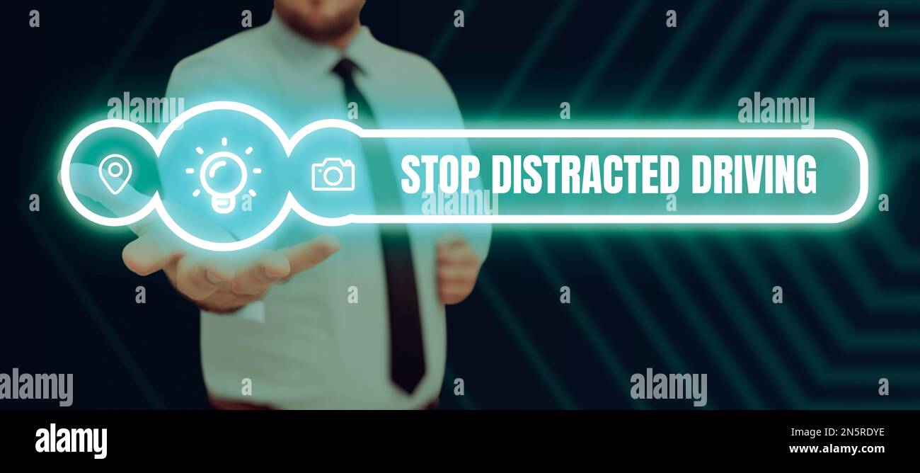 Sign displaying Stop Distracted Driving. Internet Concept asking to be ... Sign displaying Stop Distracted Driving. Internet Concept asking to be ...