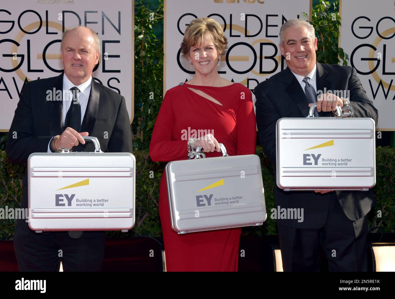 Representatives of Ernst & Young arrive at the 71st annual Golden Globe ...
