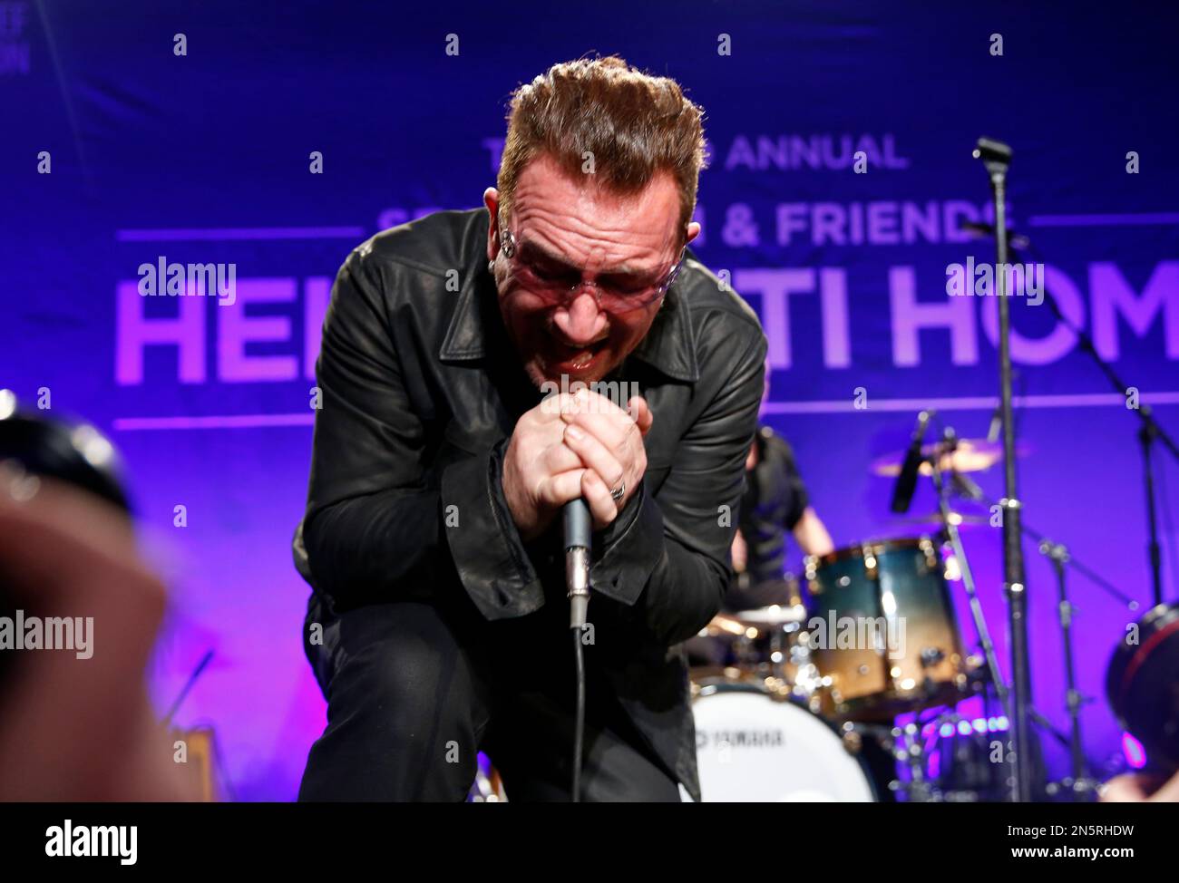 Bono performs on stage at the 3rd Annual Sean Penn & Friends HELP HAITI ...