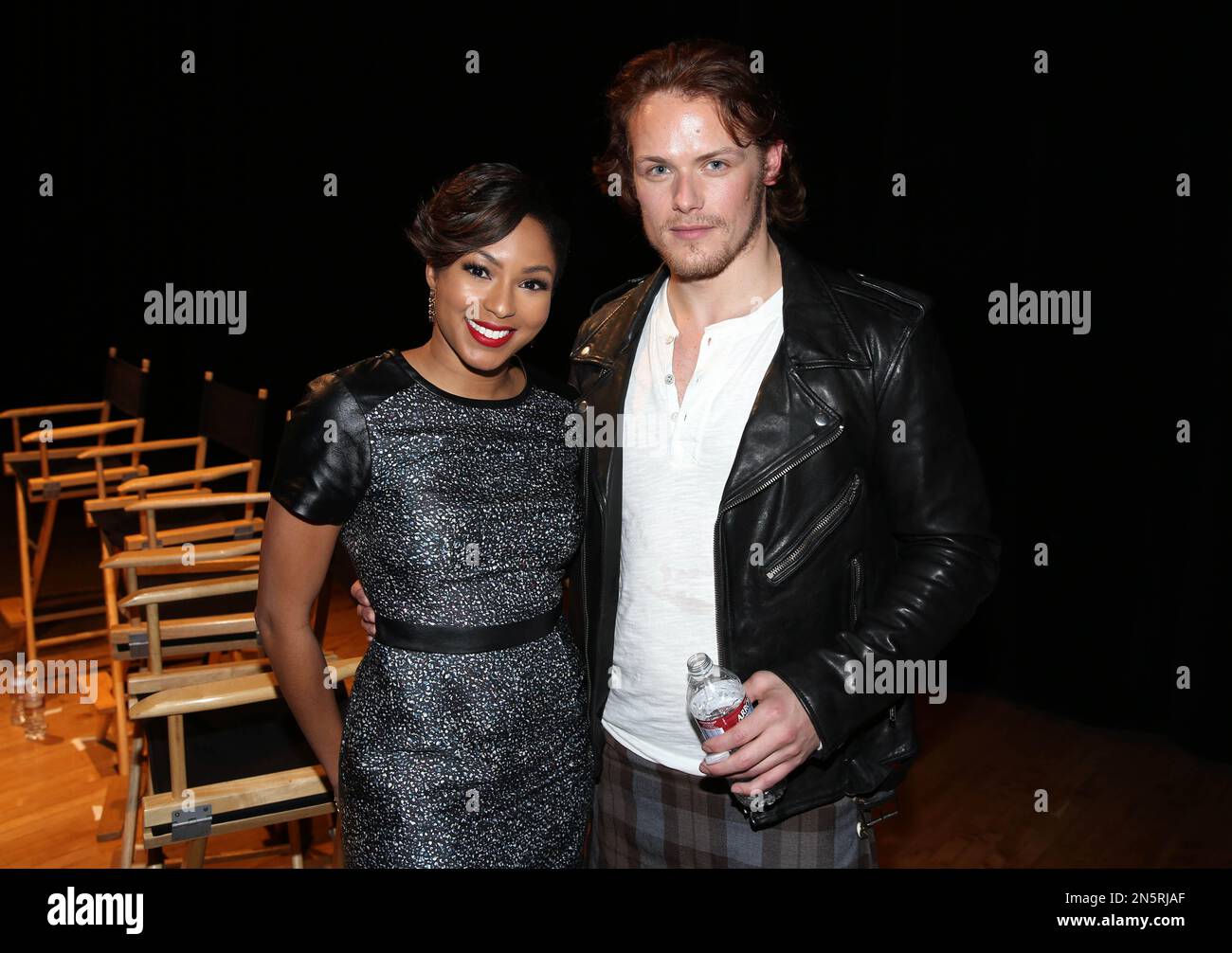 Sam Heughan, right, and Alicia Quarles pose together at The STARZ ...