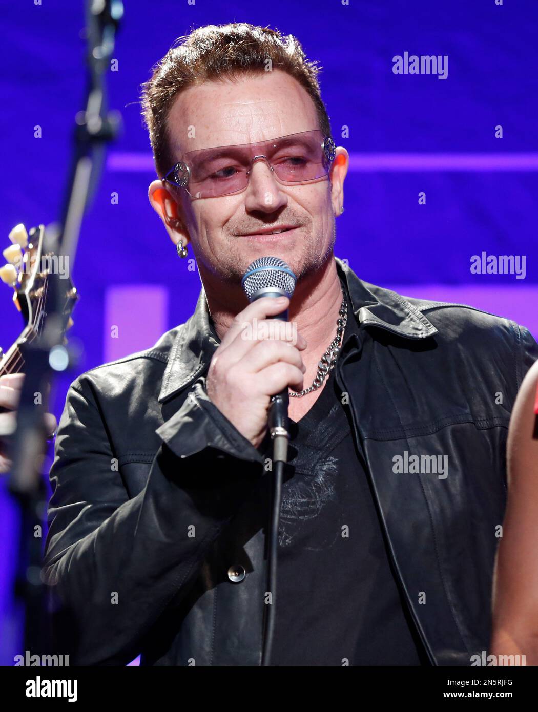 Bono performs on stage at 3rd Annual Sean Penn & Friends HELP HAITI ...