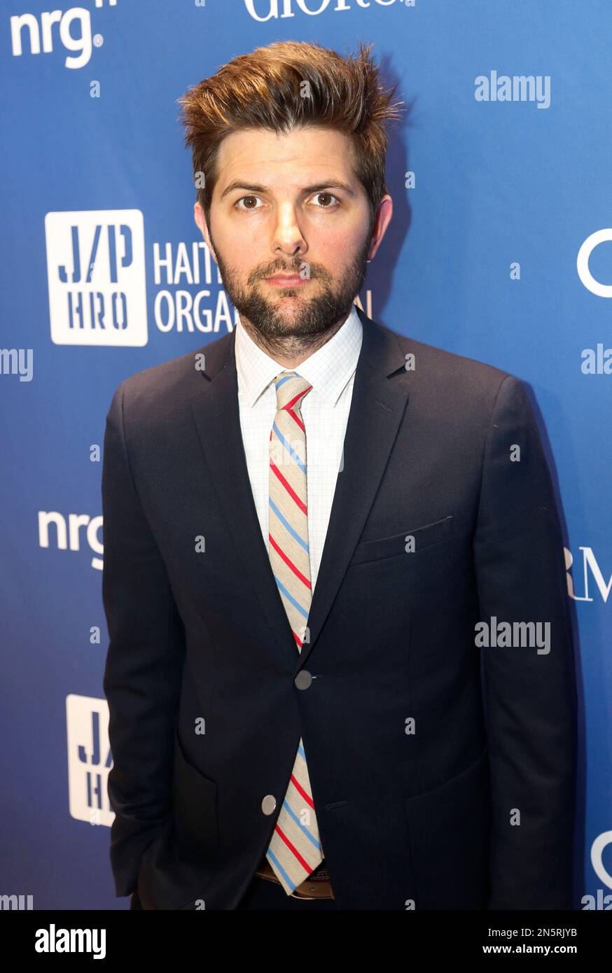 Adam Scott arrives at the 3rd Annual Sean Penn & Friends HELP HAITI ...