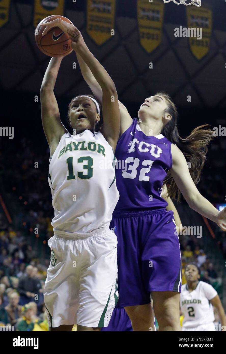 Baylor forward Nina Davis (13) shoots against TCU forward Caitlin Diaz ...