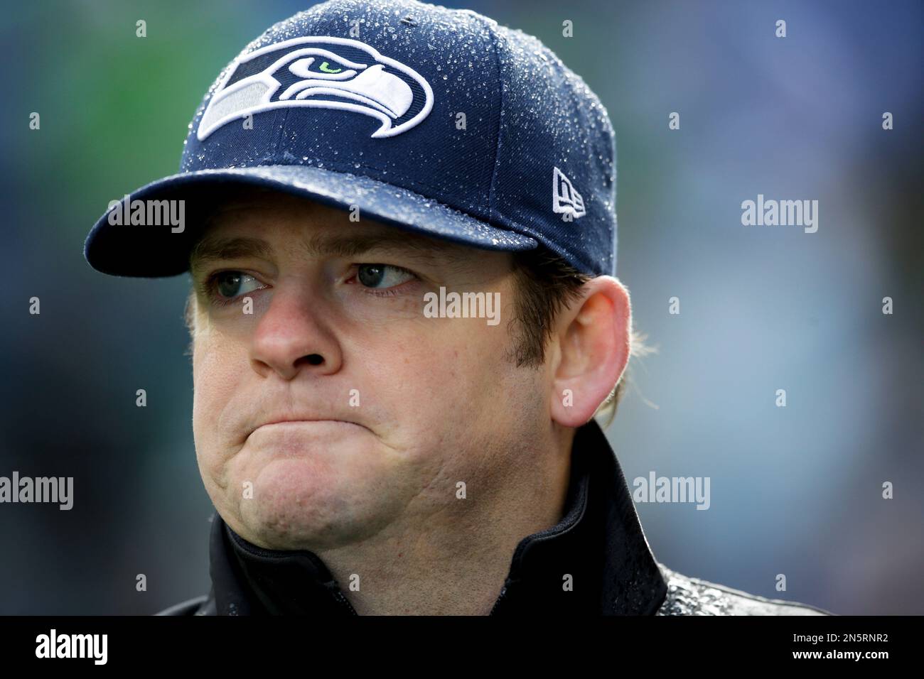 Seattle Seahawks general manager John Schneider watches as players warm ...