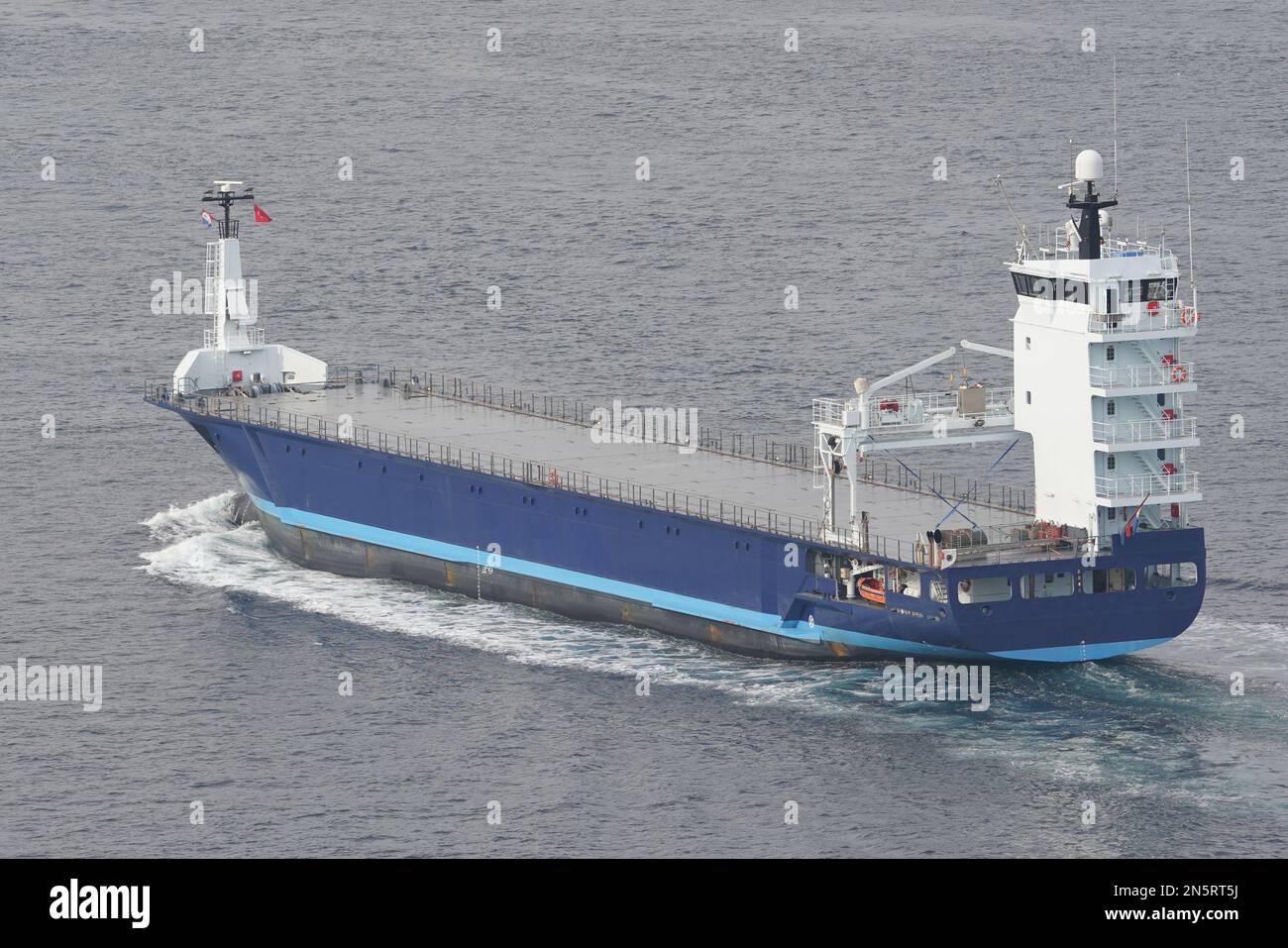 A cargo ship carrying goods between ports Stock Photo - Alamy
