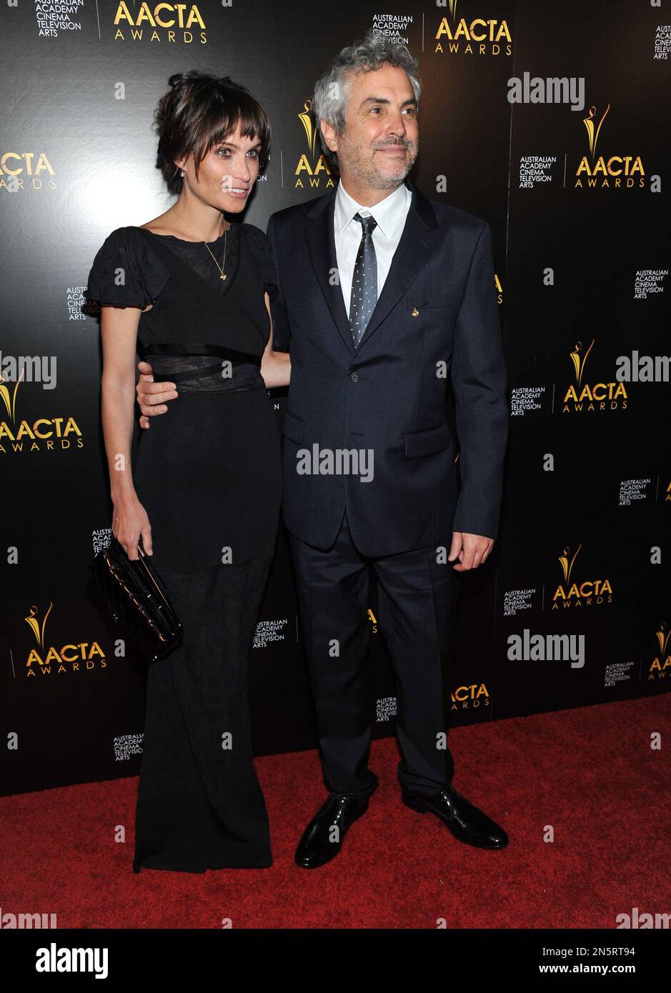 Sheherazade Goldsmith, left, and Alfonso Cuarón arrive at the 3rd ...
