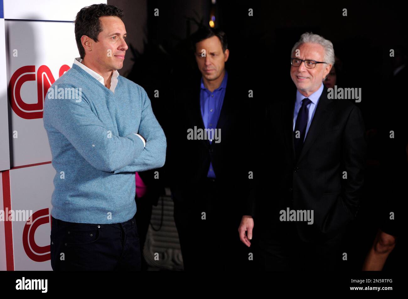 Chris Cuomo of CNN, left, poses for photographers as CNN colleagues ...