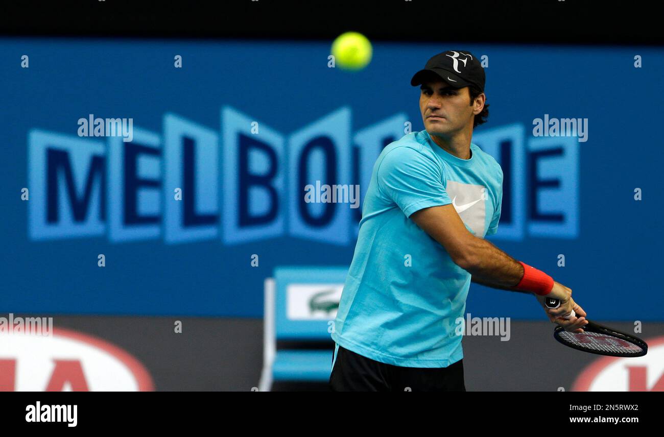 Switzerland's Roger Federer makes a forehand return during a practice ...