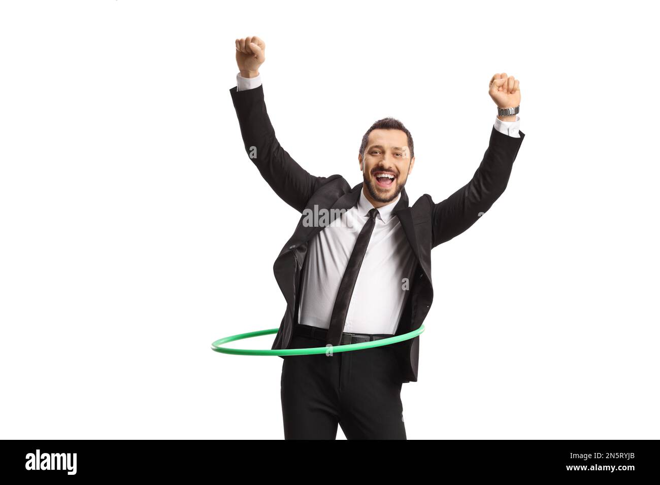 Young happy businessman spinning a hula hoop isolated on white ...