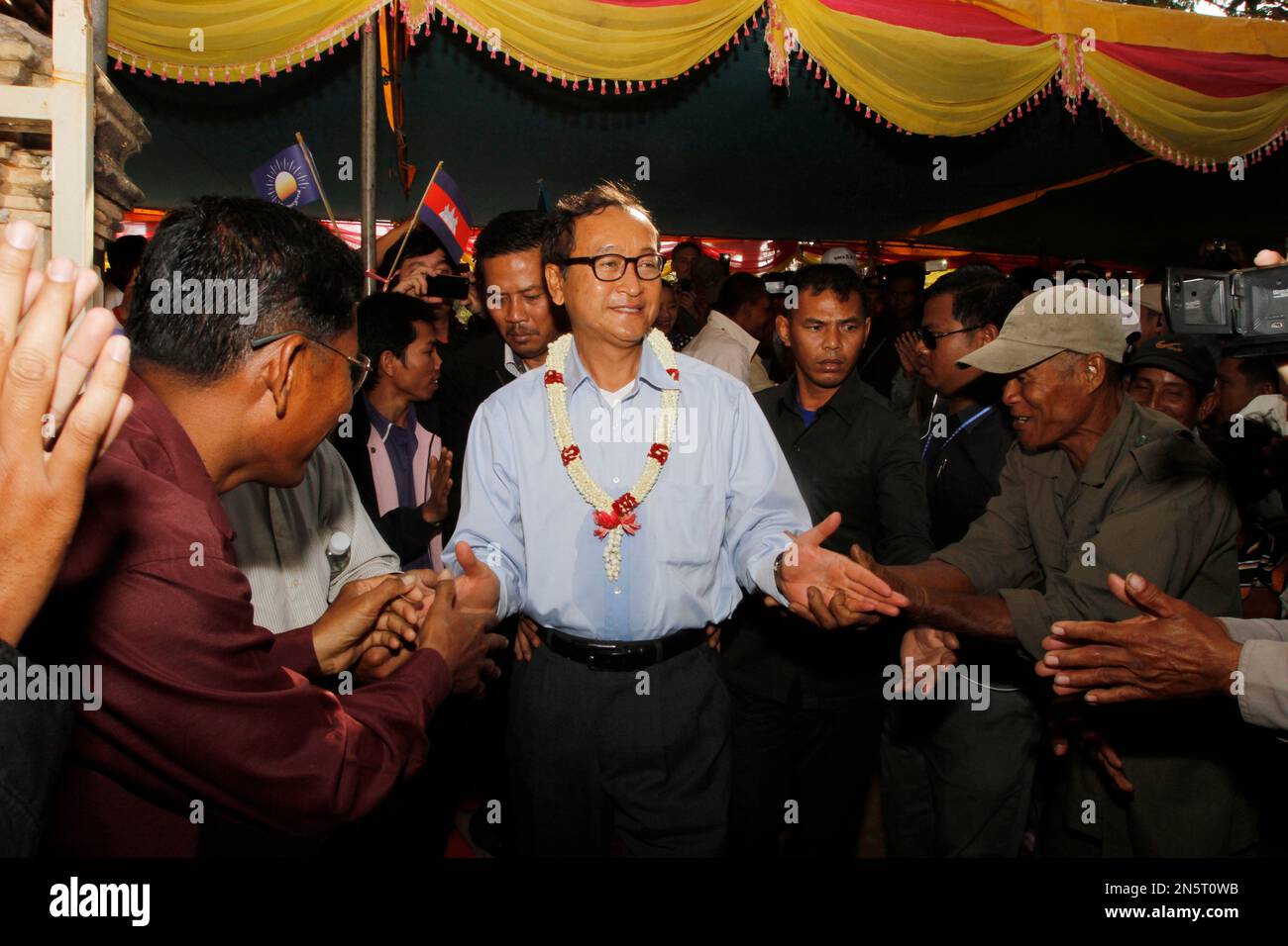 Cambodia's opposition leader Sam Rainsy, center, of Cambodia National ...