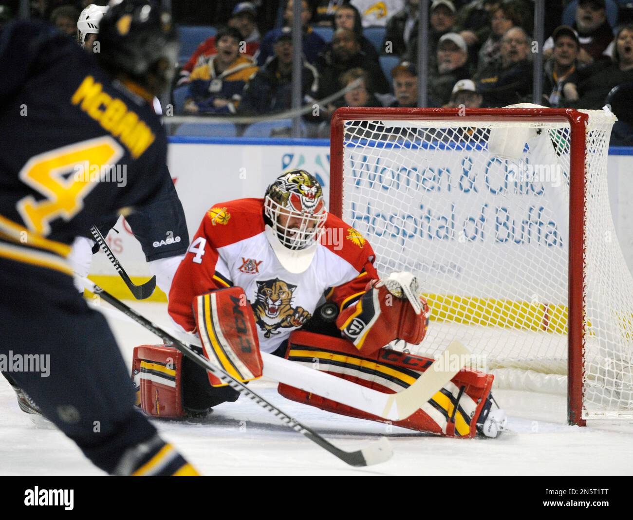 Buffalo Sabres defenseman Jamie McBain (4) shoots the puck at Florida ...
