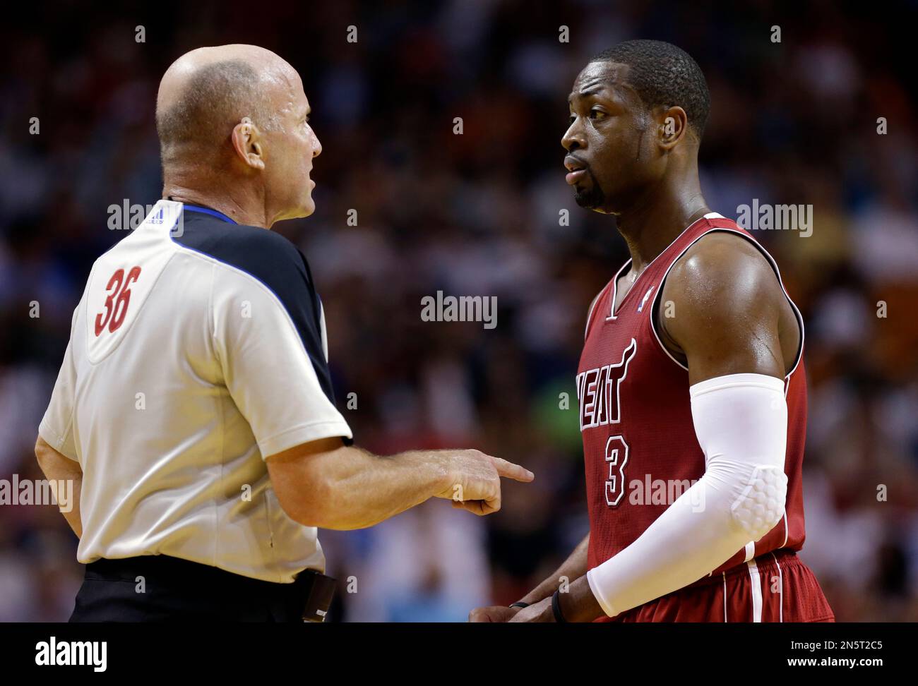 Miami Heat's Dwyane Wade (3) talks with official David Jones (36) in ...
