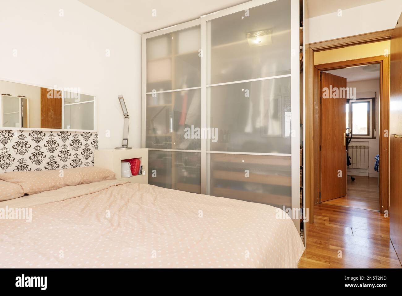 Double bedroom with wardrobe with translucent sliding doors and oak ...