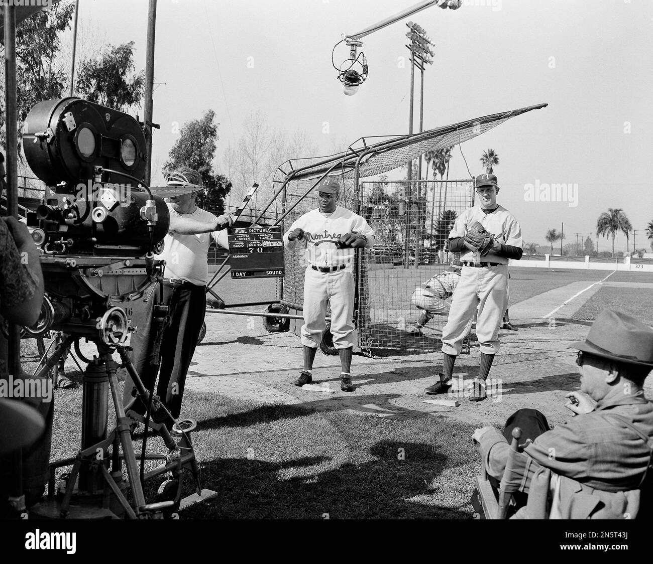 Jackie Robinson, left, and Pinky Woods, Hollywood Stars pitcher, line ...