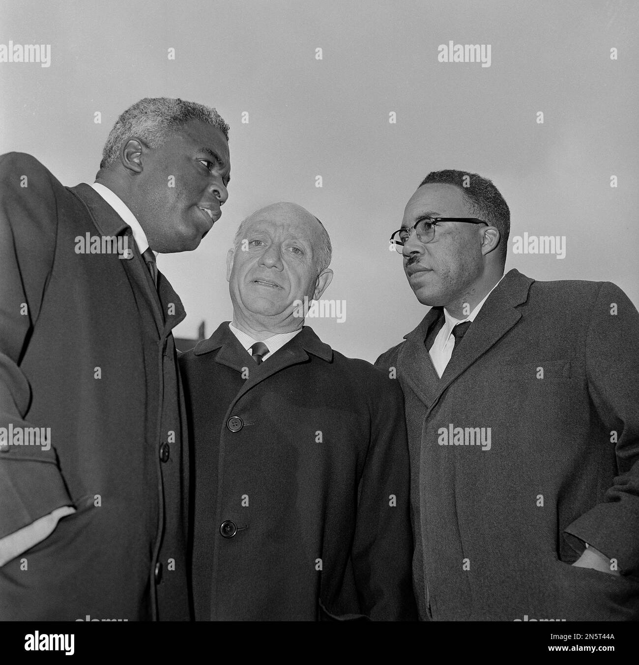 Former Brooklyn Dodger baseball star Jackie Robinson, left, Sen. Joacob ...