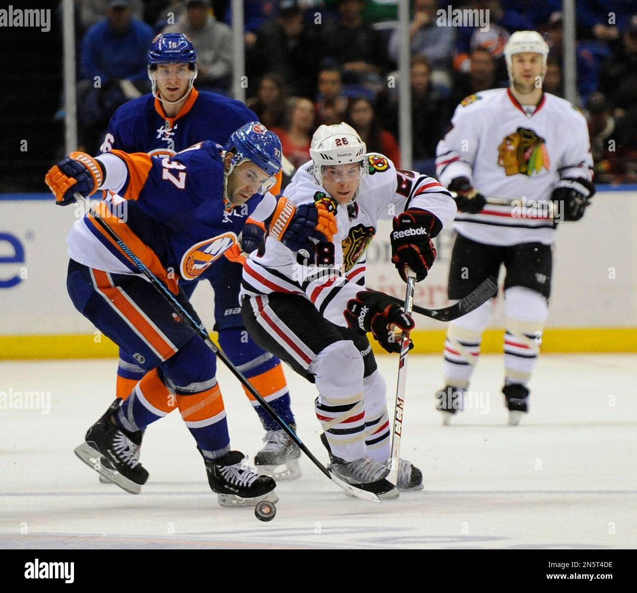 New York Islanders' Brian Strait (37) and Chicago Blackhawks' Michal ...