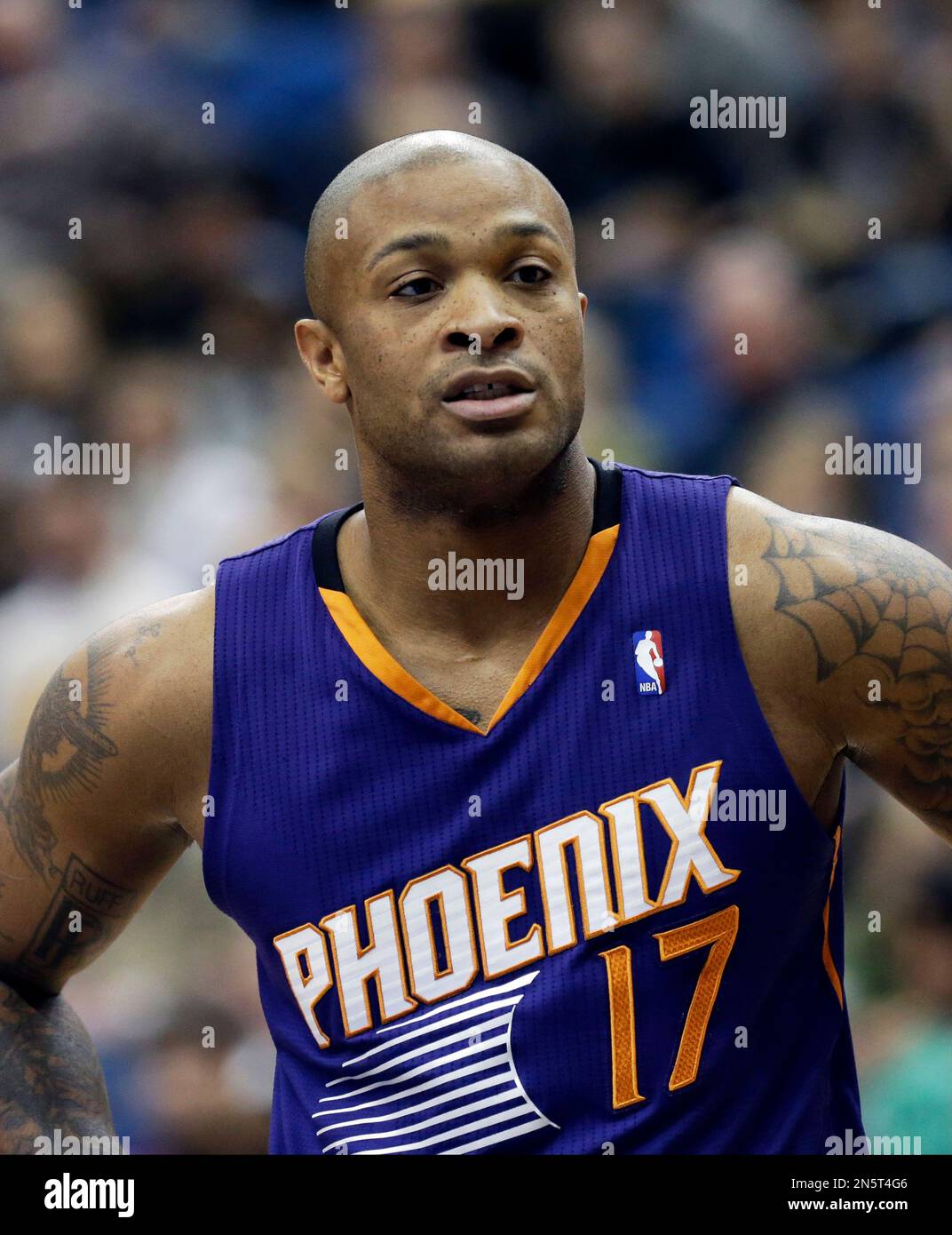 Phoenix Suns' P.J. Tucker stands on the line during a free throw in the ...