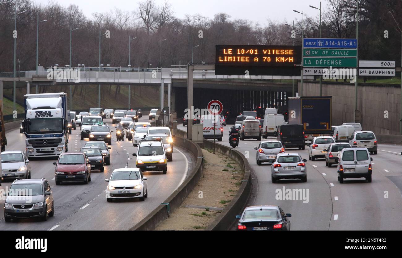 A sign on the Paris ring road 'Peripherique' announces that the speed ...