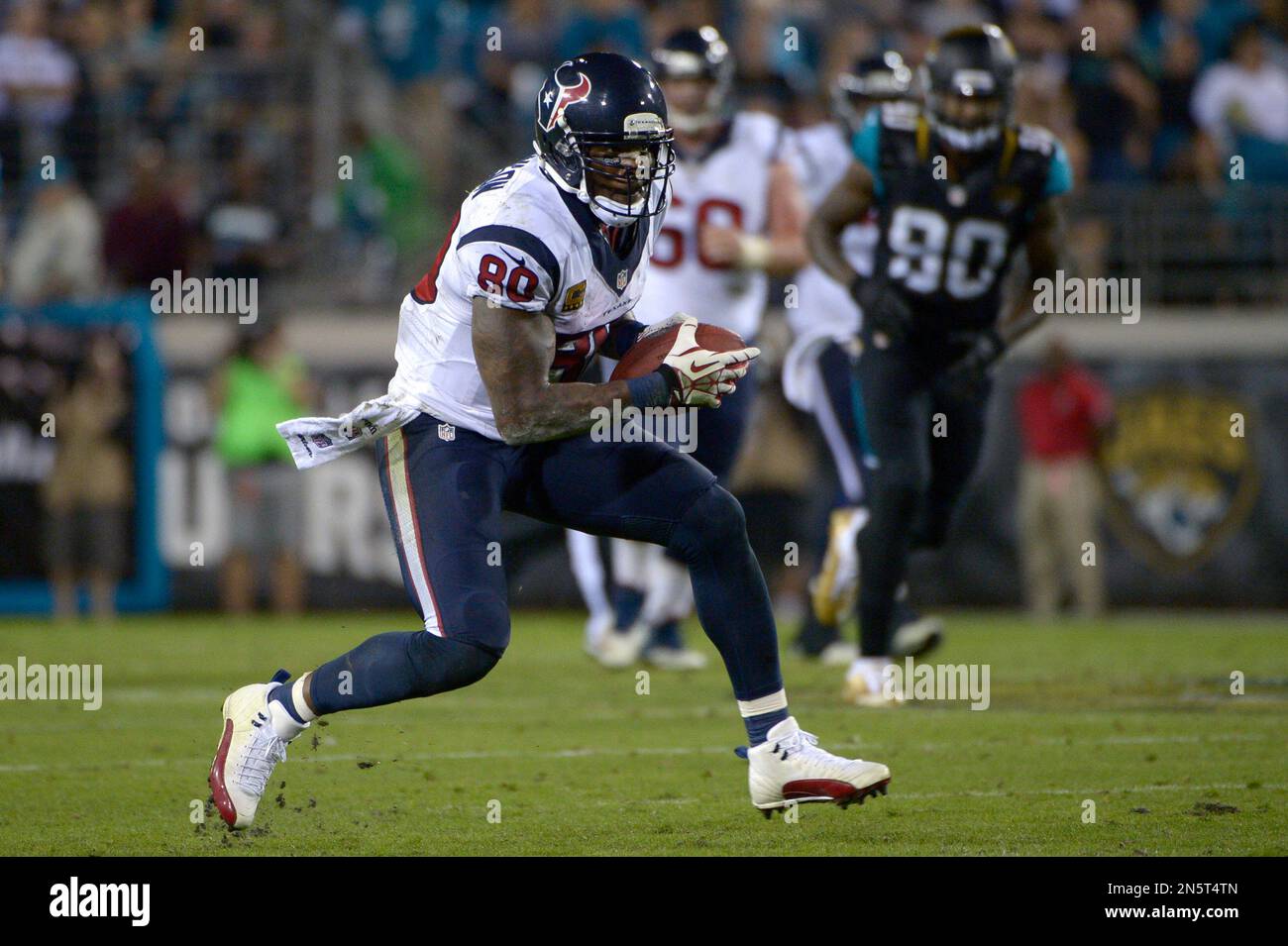 Houston Texans wide receiver Andre Johnson (80) runs after making a ...