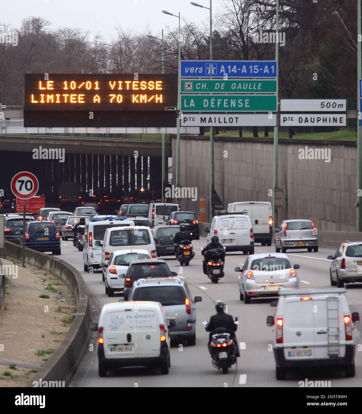 A sign on the Paris ring road 'Peripherique' announces that the speed ...