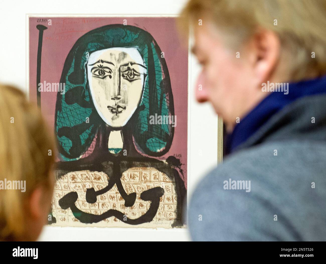 Curators Andrea Fromm and Tom Beege, right, stand in front of the ...