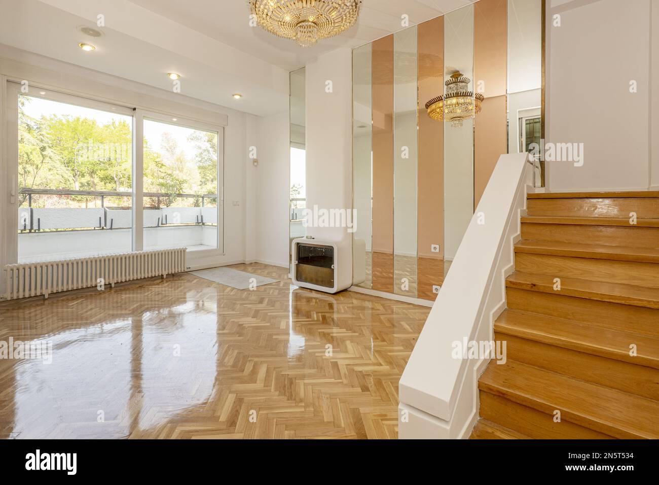 Living room of a loft-style apartment with a large terrace with ...