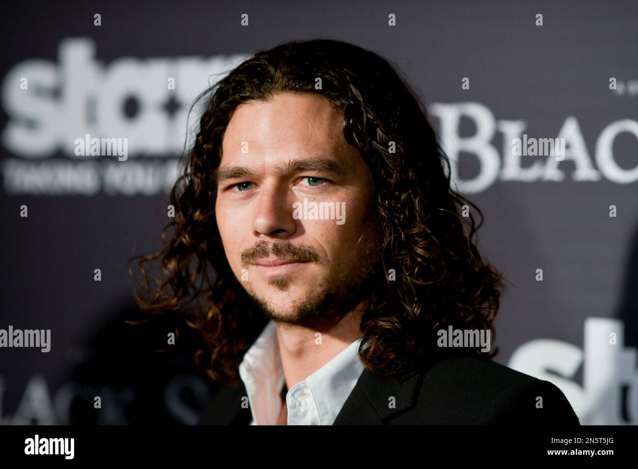 Luke Arnold arrives at the LA Premiere Screening of "Black Sails" on ...