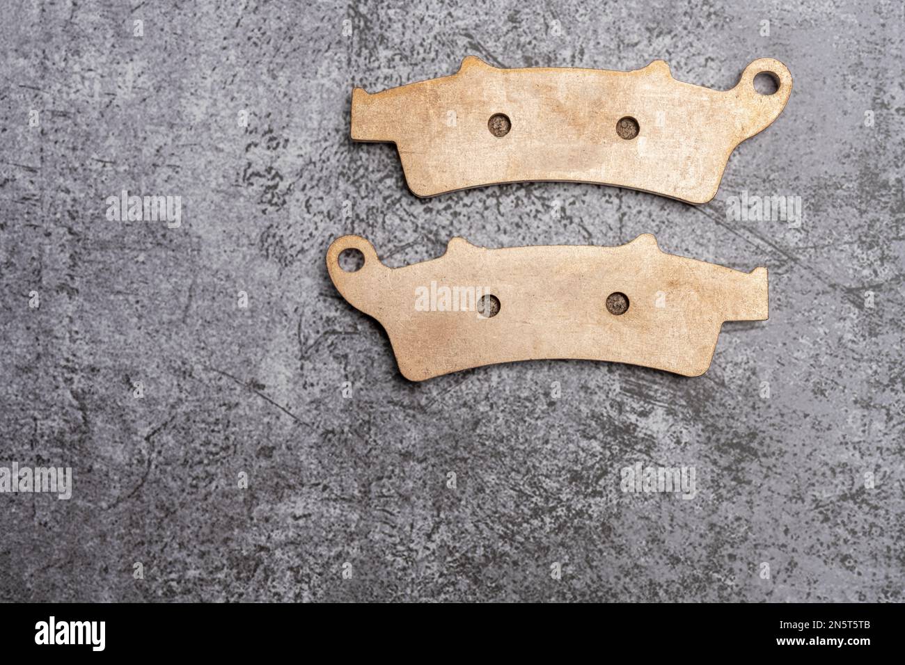 New rose gold colored metal motorcycle twin brake pads with ferodo on a ...