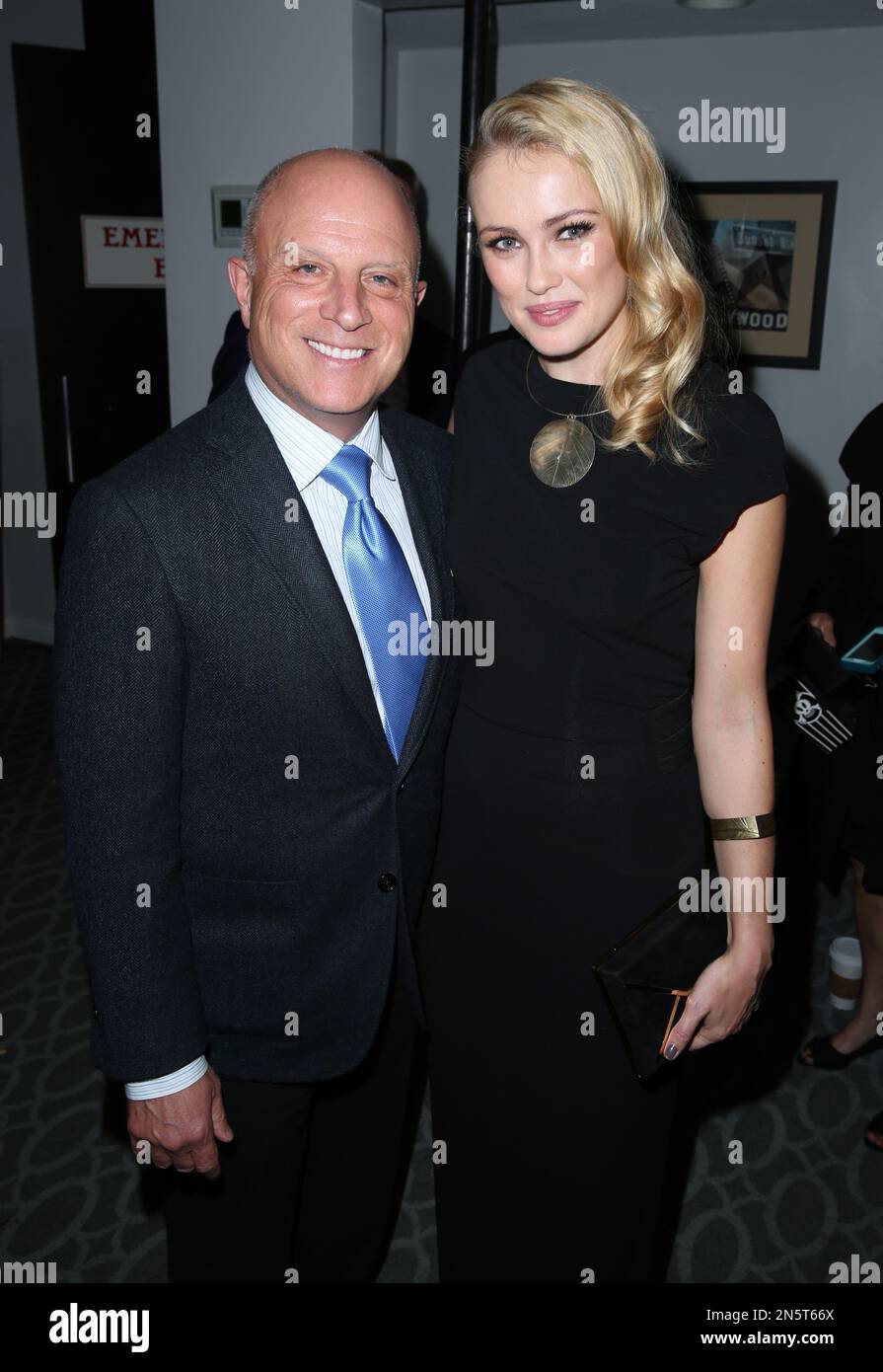 Chris Albrecht, CEO at Starz, left, and Hannah New arrive at the Starz ...