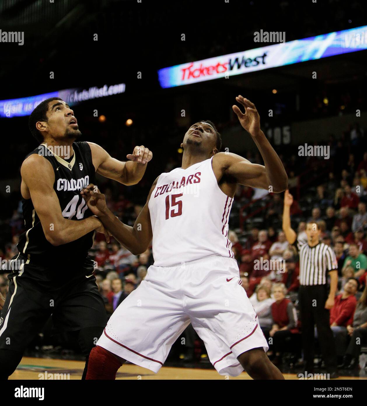Colorado’s Josh Scott (40) and Washington State’s Junior Longrus (15 ...
