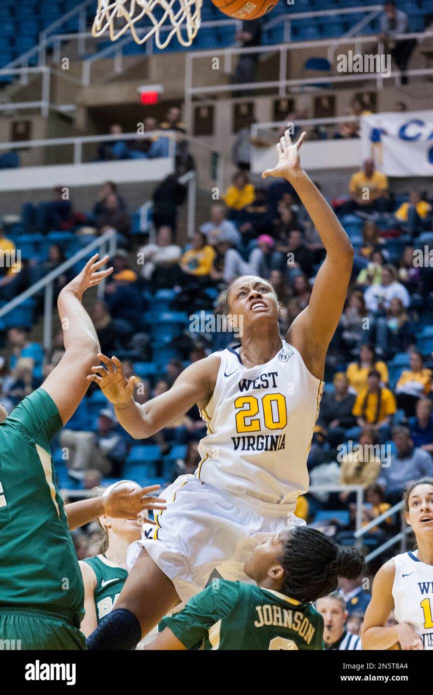 West Virginia's Asya Bussie, top, shoots over Baylor's Niya Johnson ...