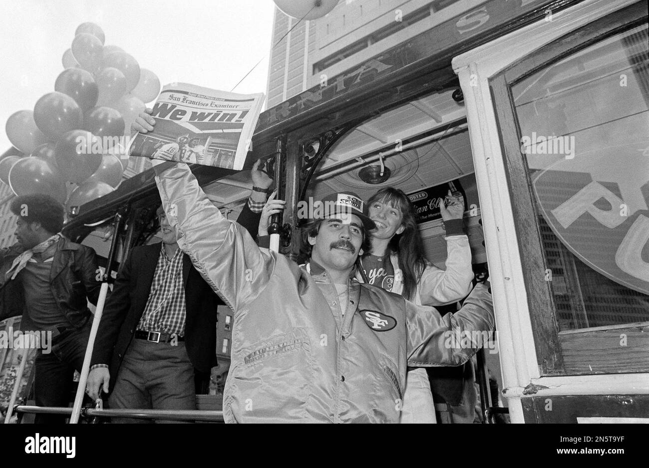 San Francisco 49ers linebacker Craig Puki waves the headlines from a ...
