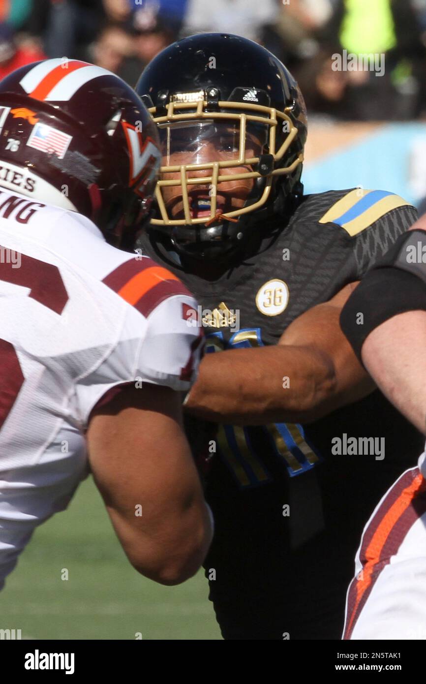 UCLA linebacker Anthony Barr battles a Virginia Tech lineman during the ...
