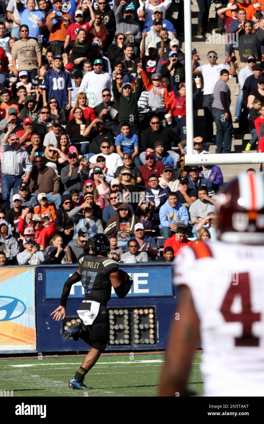 UCLA quarterback Brett Hundley scrambles close to 80 yards for a ...