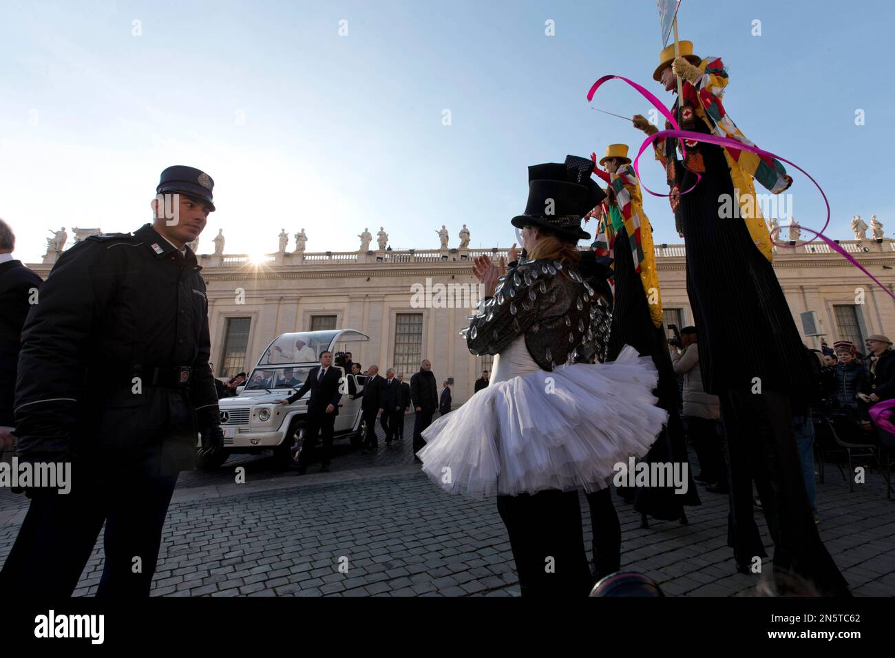 Members of the Golden Circus welcome Pope Francis as he arrives for his ...
