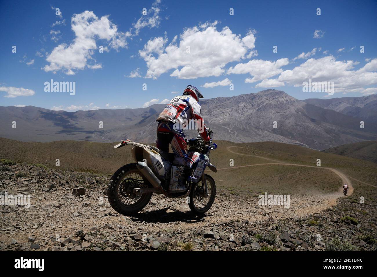Yamaha rider Damien Bonnet of France races down a mountain during the ...