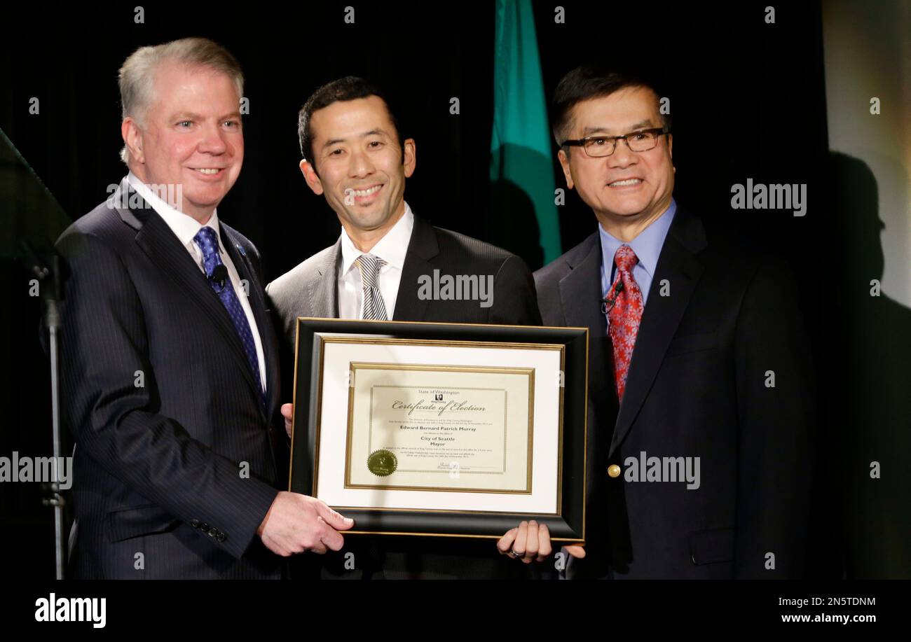 New Seattle Mayor Ed Murray, left, stands with husband Michael Shiosaki ...